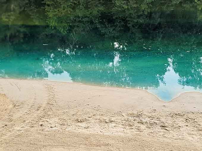 That turquoise water against white sand proves Kentucky has been holding out on us all along.