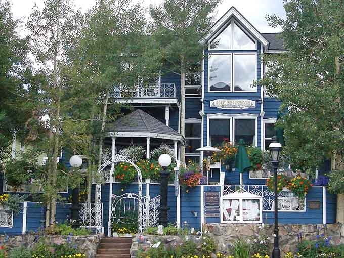 That blue Victorian facade isn't just pretty, it's your beacon to some of the best desserts in the Rockies.