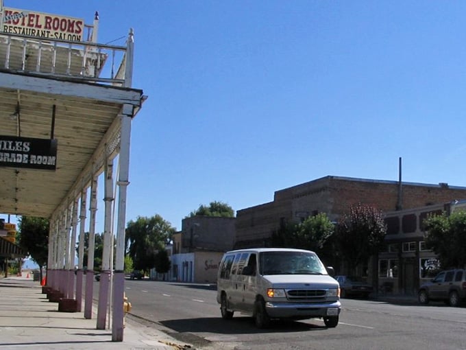 Quiet Alturas street with vintage storefronts and sunny skies captures small town charm, inviting visitors to slow down and explore.