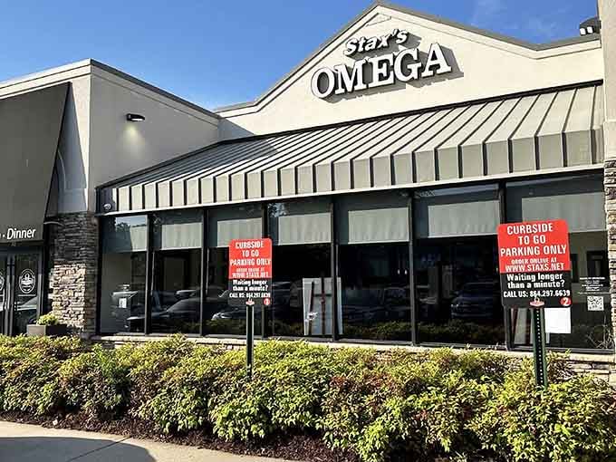 That striped awning practically waves you inside like a friendly neighbor inviting you over for breakfast.