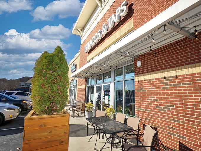 Those outdoor planters and patio seating promise the kind of relaxed dining experience your Tuesday desperately needs.