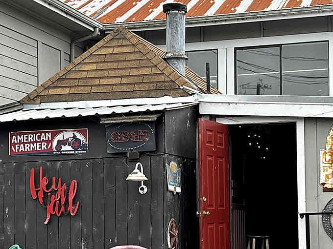 That charming red door welcomes you into burger paradise, where the American Farmer sign hints at quality beef ahead.