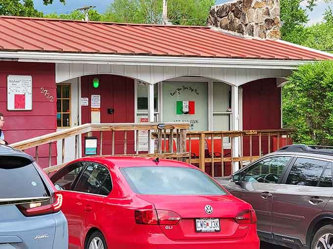 That cheerful red exterior isn't trying to win design awards, just your heart and your appetite.