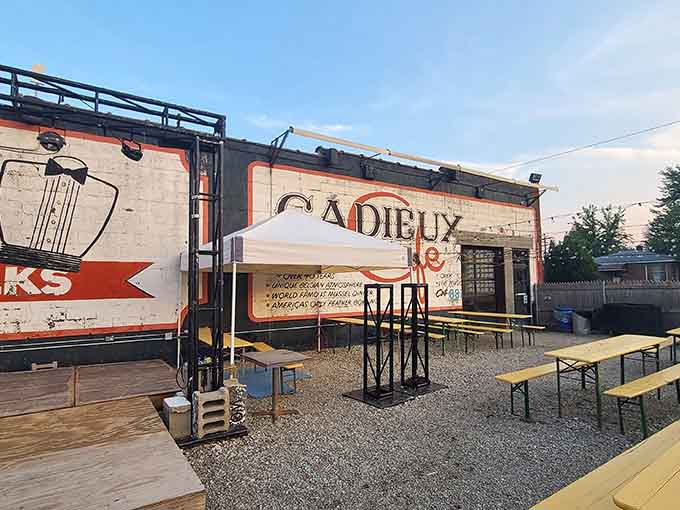 The outdoor beer garden at Cadieux Cafe glows under string lights, where Belgian tradition meets Detroit summer nights perfectly.