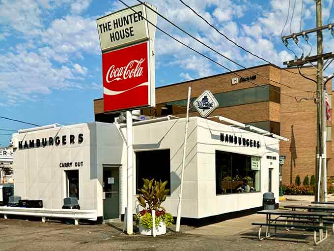 That gleaming white exterior isn't trying to impress anyone, just quietly serving burger perfection since forever.