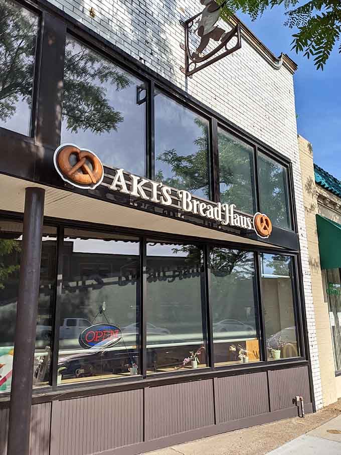 That gleaming storefront with the pretzel logo isn't just inviting, it's practically begging you to come inside.