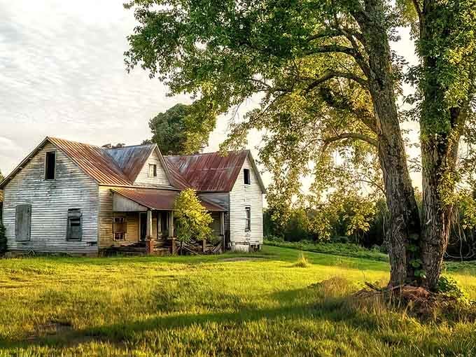 Golden hour transforms these weathered mill houses into something straight out of a Southern Gothic novel.