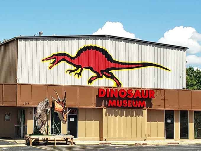 That colorful Spinosaurus on the building isn't just decoration, it's your first hint that prehistory awaits inside.