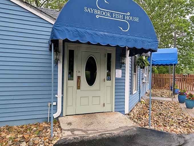That blue awning isn't just charming, it's practically waving you inside for the seafood feast of your life.