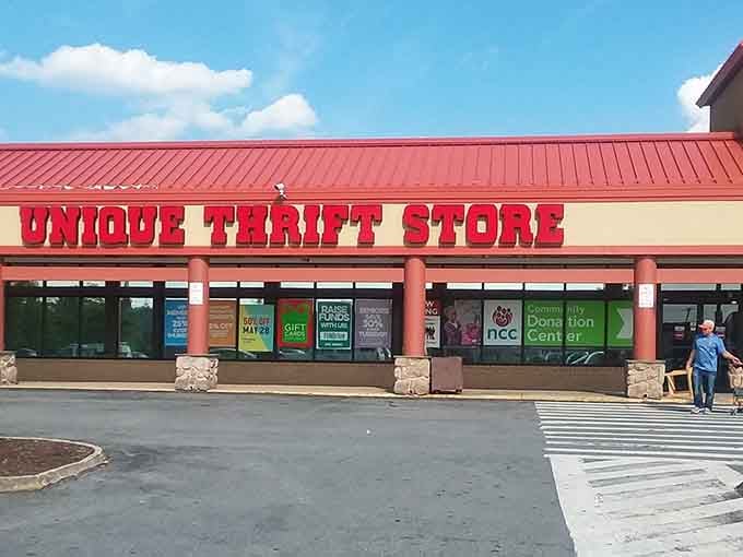 That bold red sign isn't just calling you, it's practically singing a siren song of secondhand treasures waiting inside.