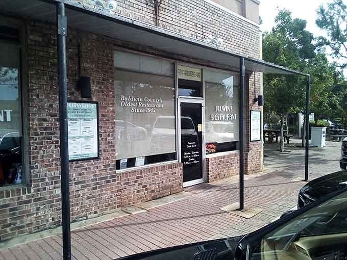 That brick storefront might look modest, but inside awaits breakfast magic that'll change your morning routine forever.