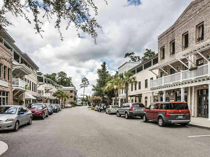 Southern charm meets practical living on these tree-lined streets where porches outnumber pretensions and neighbors actually wave.