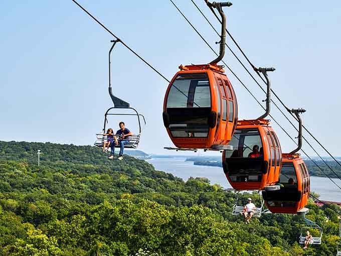 Those bright orange gondolas gliding over Illinois forests prove you don't need the Alps for spectacular aerial views.