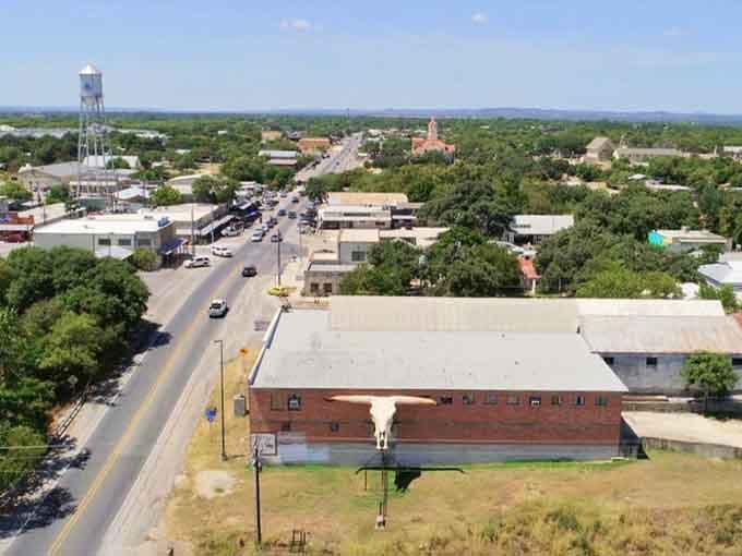 From above, Bandera spreads out like a postcard from a simpler time when towns had character instead of chain stores.