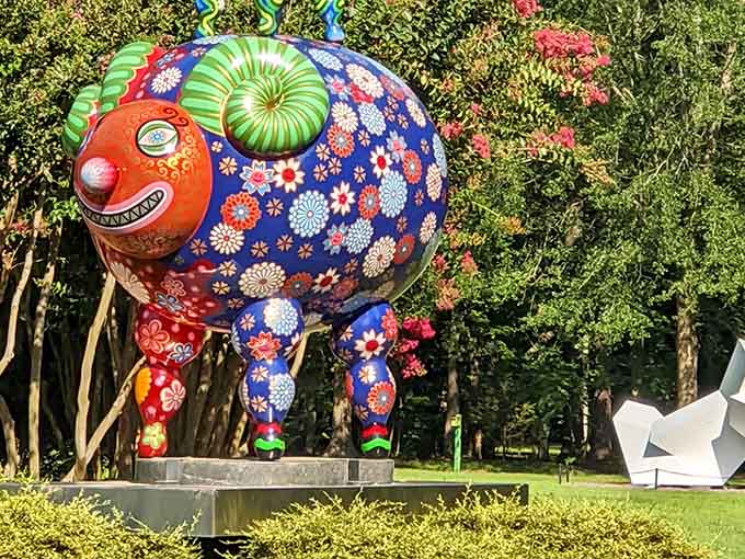 When your local sculpture garden casually drops a psychedelic creature that looks like joy took physical form.