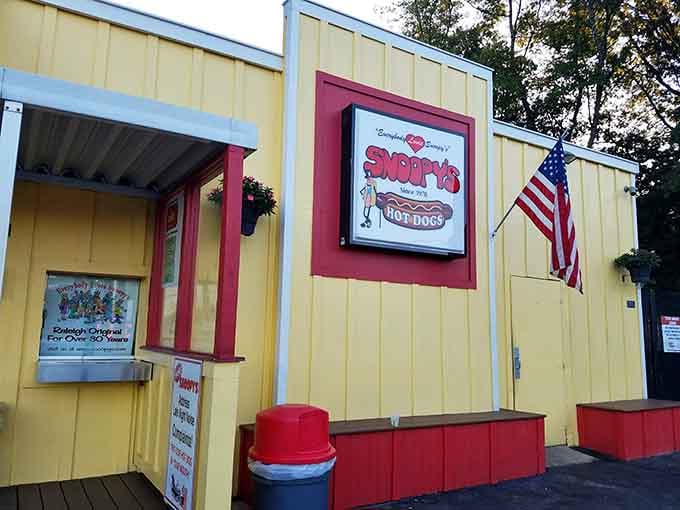 That cheerful yellow building with red and white stripes isn't trying to hide&mdash;it's practically waving you down from the road.