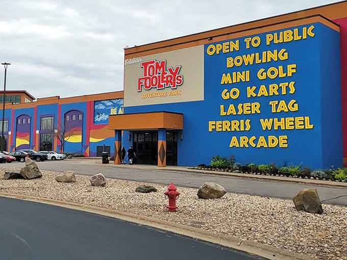 The exterior promises bowling, mini golf, go-karts, laser tag, a Ferris wheel, and arcade games; basically everything except a reason to leave.
