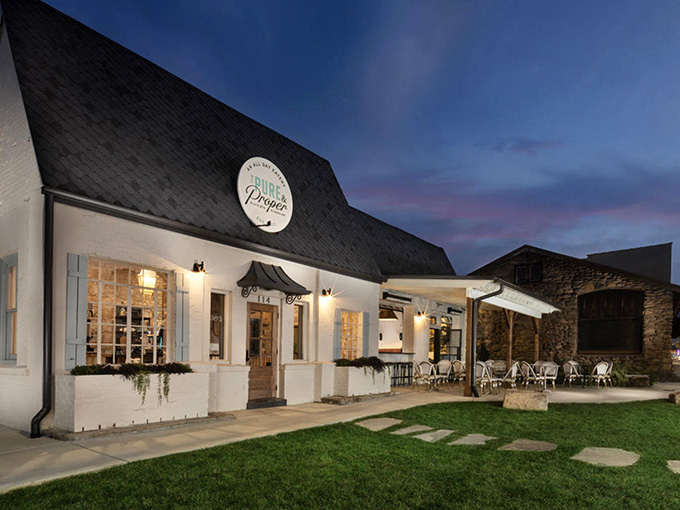 That historic facade glows like a beacon for brunch lovers, promising good things behind those charming white walls.