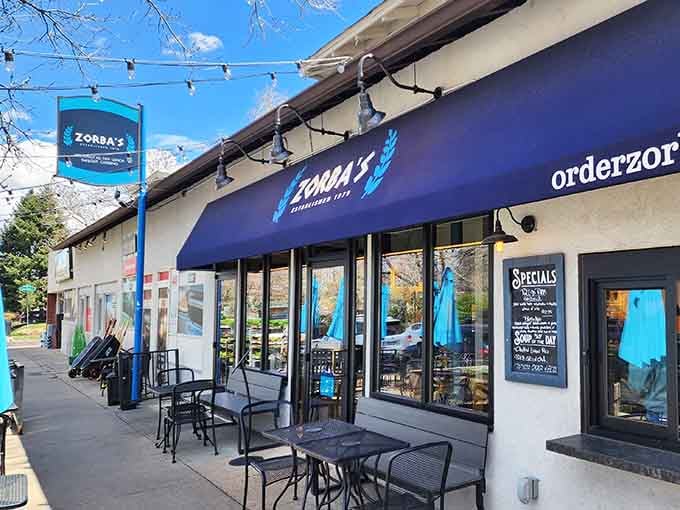 That signature blue awning isn't just for show, it's your beacon to Mediterranean bliss in the Denver neighborhood.