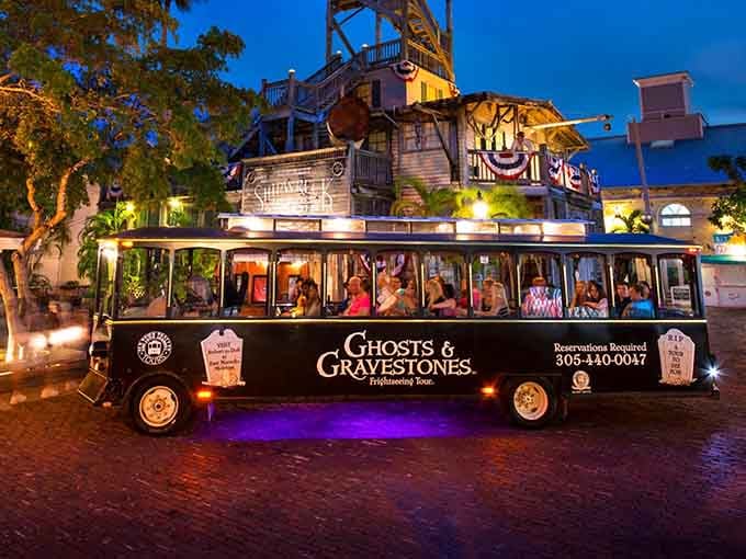 That black trolley glowing purple in the Key West twilight isn't heading to happy hour, it's chasing spirits instead.