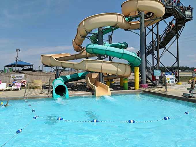 Towering slides twist through the air like colorful spaghetti, promising thrills that'll make your stomach do backflips.