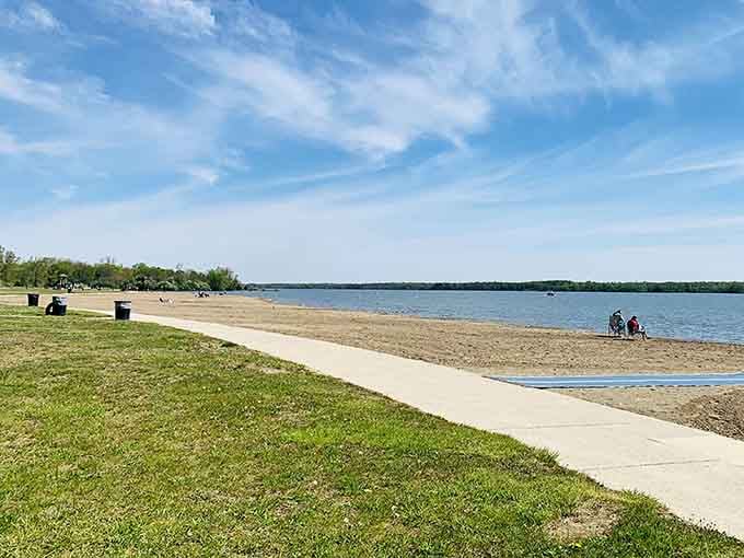 That pristine stretch of sand meeting calm blue water proves Ohio knows how to do beaches right.