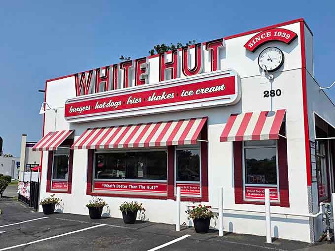 That red and white striped awning has been calling hungry travelers home since before your parents' first date.