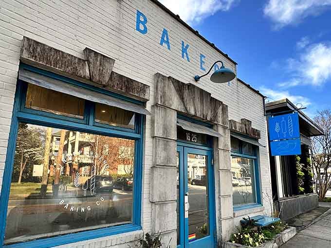 That bright blue "BAKERY" sign isn't just decoration; it's a beacon calling carb lovers home to happiness.