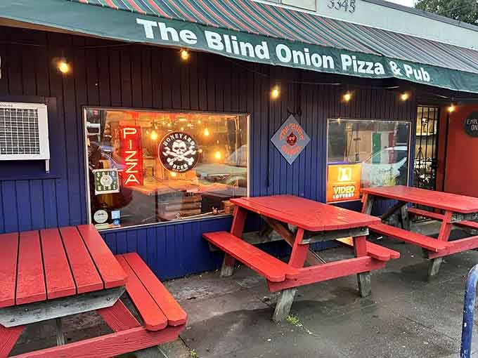 Those red picnic tables have seen more pizza parties than your average backyard barbecue ever will.