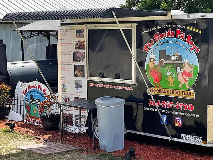 The colorful logo and that massive smoker tell you everything you need to know: serious barbecue happens here daily.