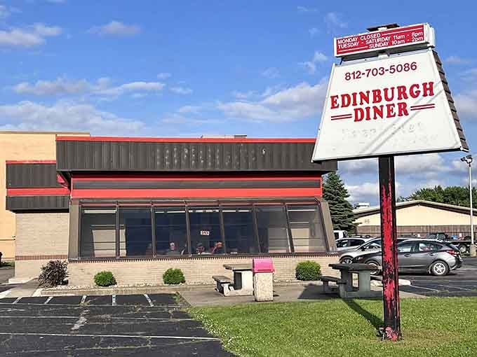 That classic roadside sign towers over the parking lot like a beacon calling all tenderloin pilgrims home.
