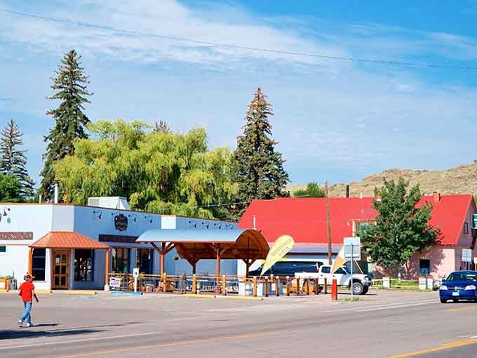 Del Norte's downtown stretches beneath that impossibly blue Colorado sky like a postcard that forgot to exaggerate.