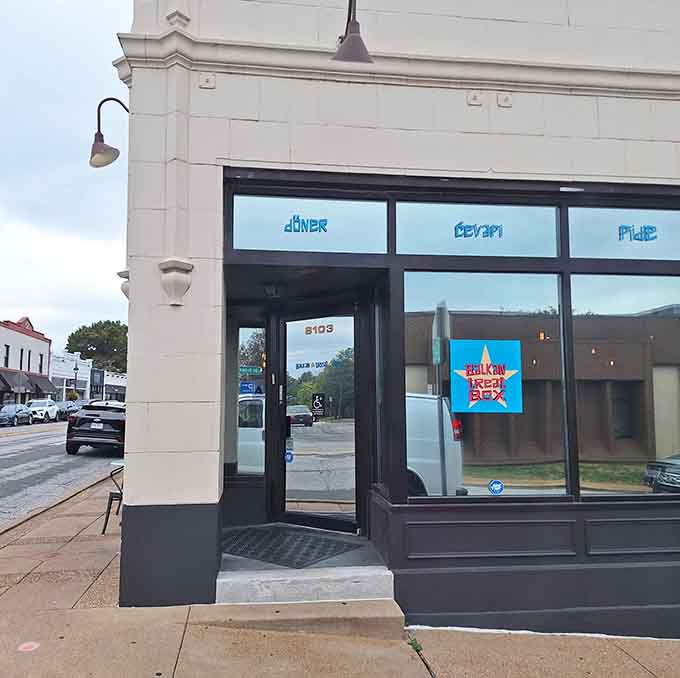 That classic corner building architecture meets modern Balkan cuisine, and somehow it all just works perfectly together.