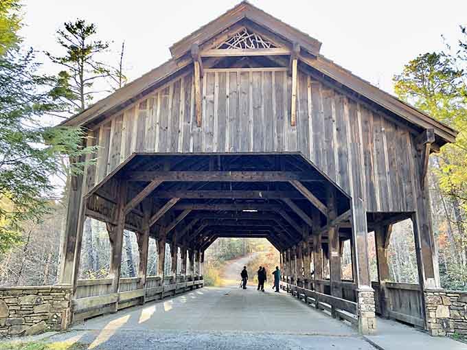 There she stands in all her weathered glory, a wooden masterpiece that makes modern bridges look positively boring.