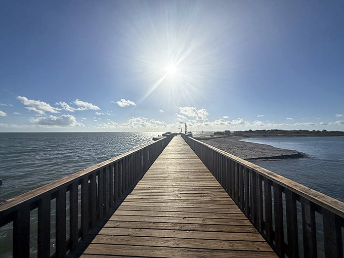 This pier stretches toward the horizon like a wooden invitation to leave your worries on the shore behind you.