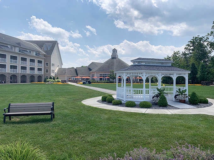 That pristine gazebo and manicured lawn look like a movie set, but this lakeside lodge is gloriously real.