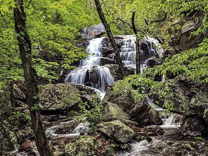 Water cascading over ancient volcanic rock in multiple tiers&mdash;nature's own fountain show, no admission required.