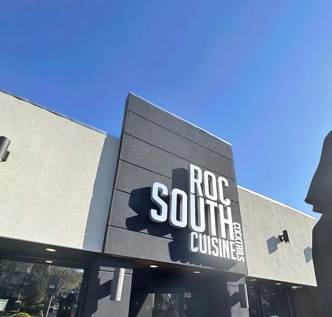That modern exterior isn't fooling anyone, this place is serving up serious soul food behind those sleek walls.