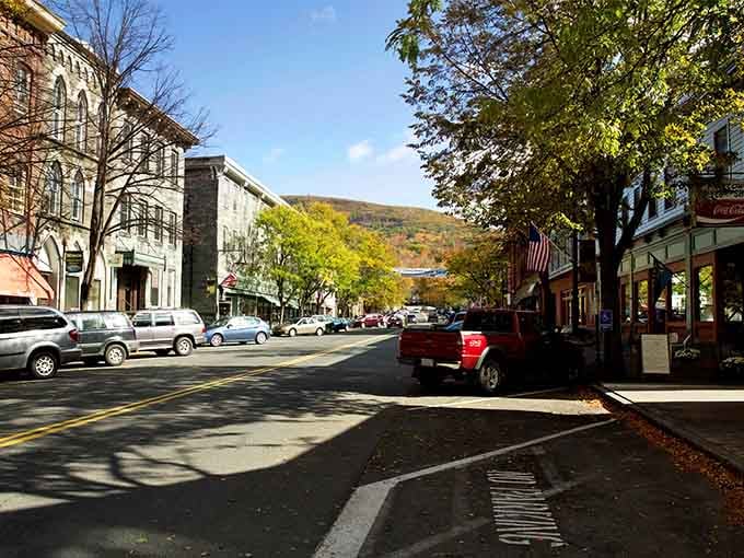 Main Street unfolds like a postcard that somehow escaped becoming a chain store wasteland—mountains included free of charge.