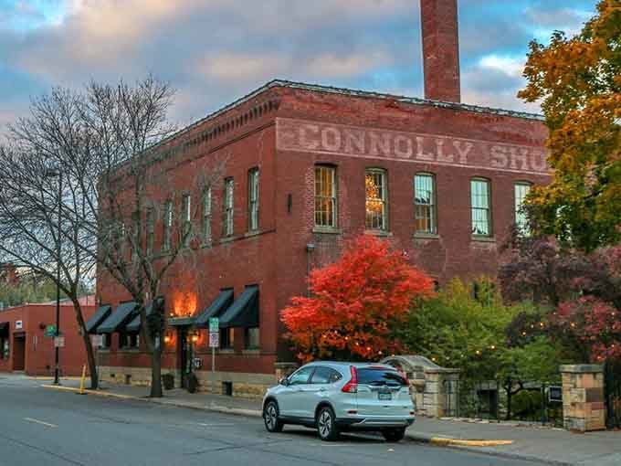 Historic brick buildings glow golden at sunset, proving that Stillwater's autumn beauty isn't just good, it's absolutely show-stopping.