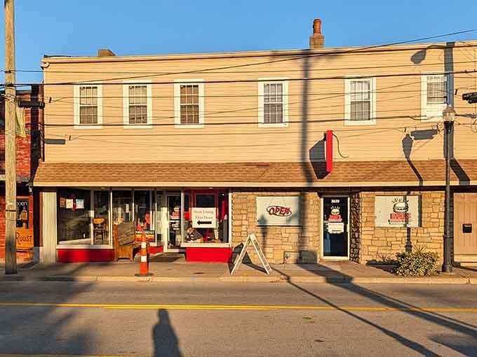 Golden hour light bathes this unassuming Covington storefront where burger dreams become deliciously oversized reality every single day.