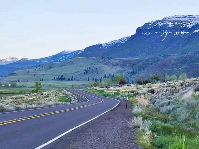 The open road stretches endlessly ahead, promising adventure in every mile of this stunning high desert landscape.