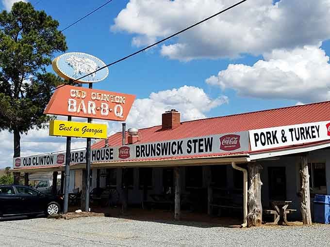 That vintage signage and red metal roof tell you everything: this is where serious barbecue happens, not corporate nonsense.