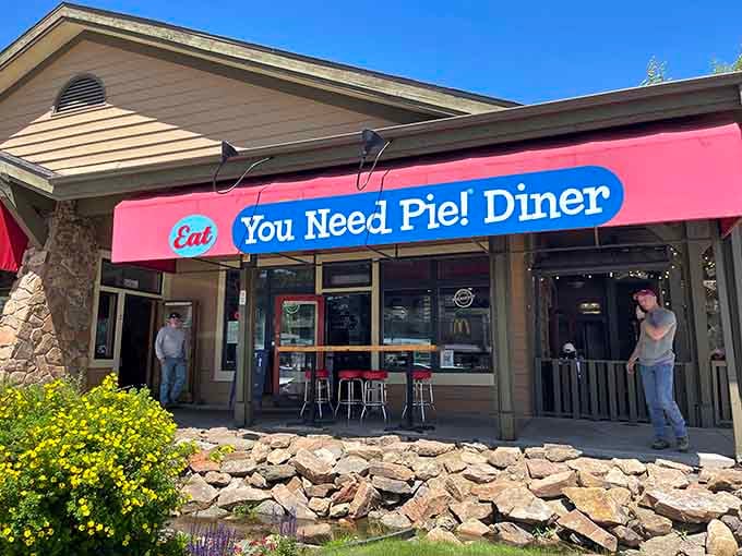 That pink and blue sign isn't whispering suggestions; it's stating facts you'll understand after one bite.