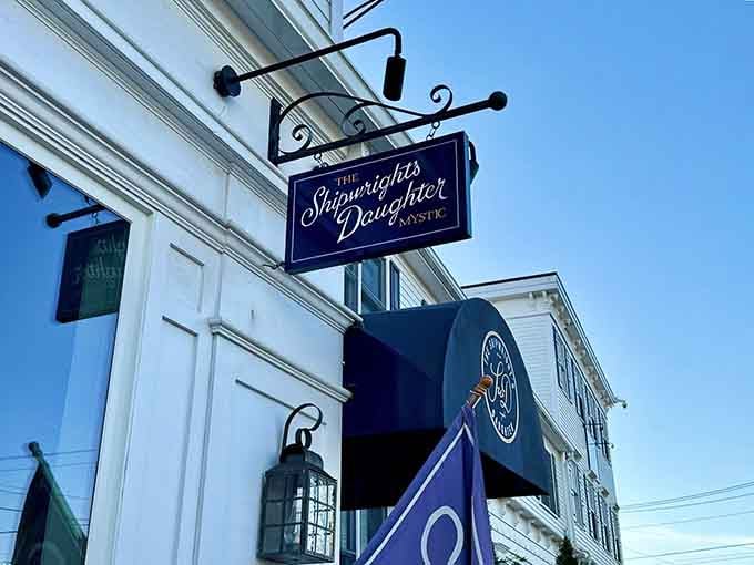 That navy awning signals you've arrived somewhere special, where exceptional dining awaits inside these welcoming doors.