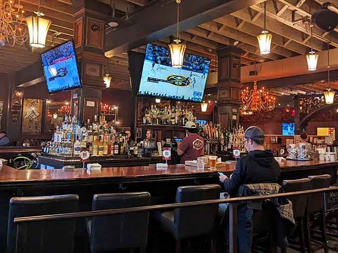 Gather around the comfortable bar for a lively evening filled with great conversation, glowing chandeliers, and a truly welcoming atmosphere.