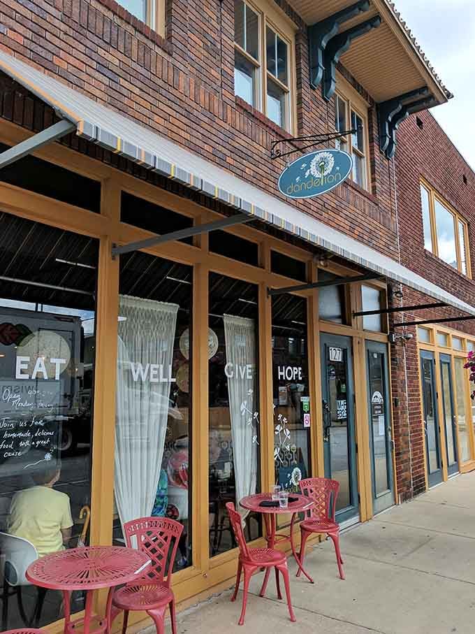 The storefront windows spell it out clearly: "EAT WELL GIVE HOPE," which is basically the mission statement we all need.