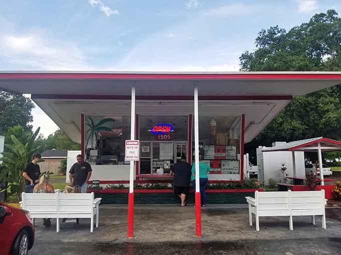 The welcoming outdoor seating and neon "OPEN" sign promise good things ahead for hungry travelers passing through.