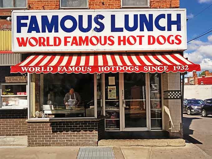 That red and white striped awning has been beckoning hungry souls since the Depression era, promising tiny hot dogs with enormous flavor.