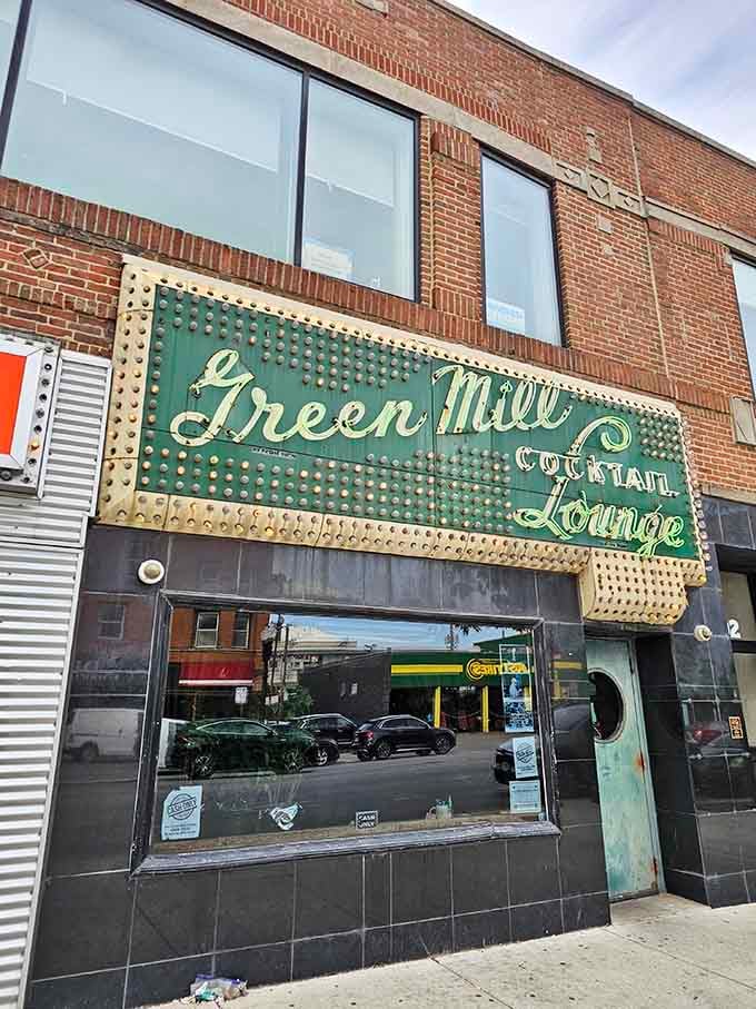 That vintage neon glow isn't a reproduction, it's the real McCoy welcoming you to jazz history.